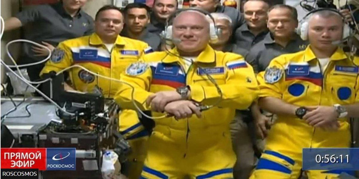 Russian cosmonauts board International Space Station wearing Ukrainian ...